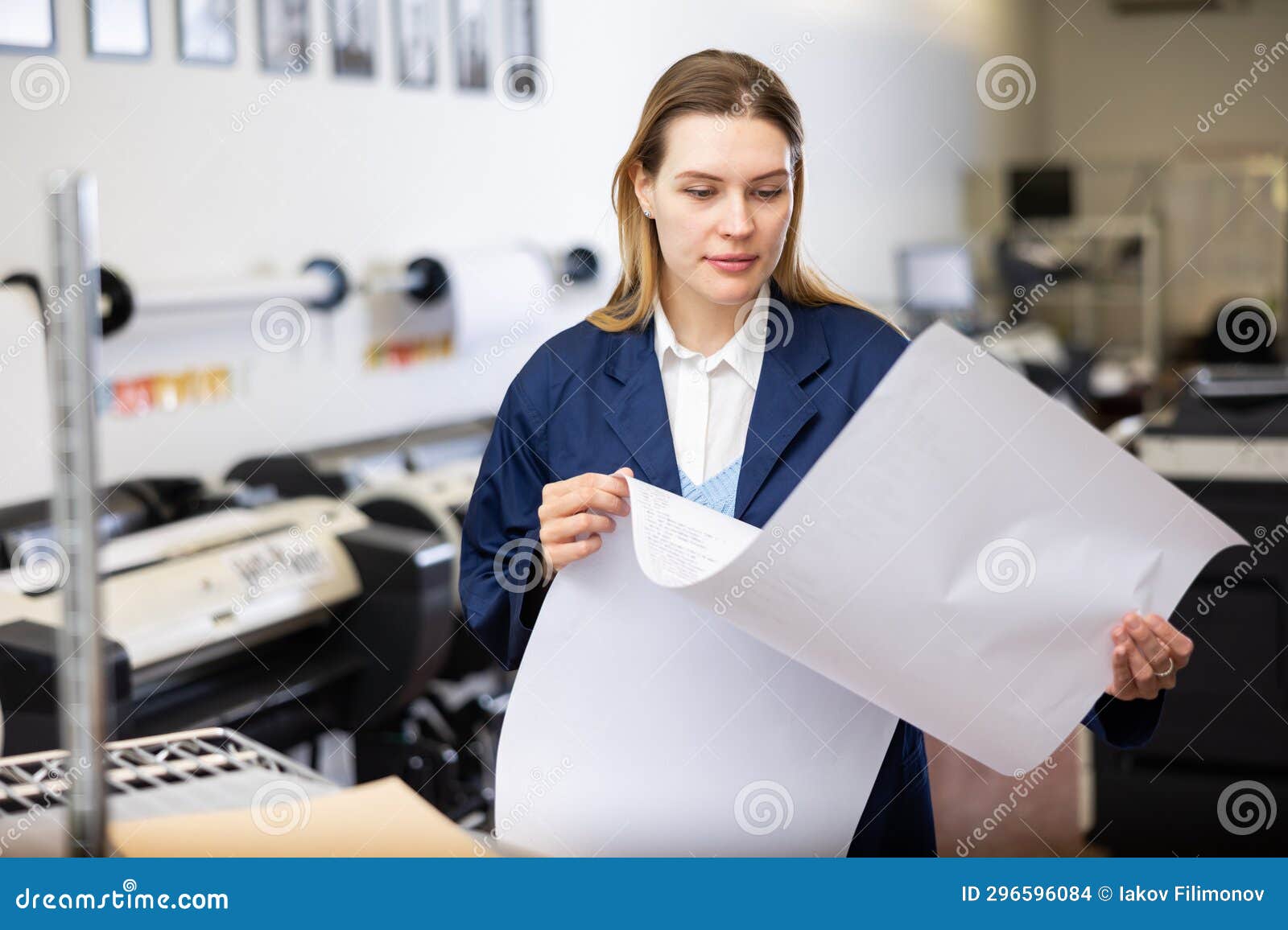 Woman Checking Large Format Paper after Printing Stock Photo - Image of ...