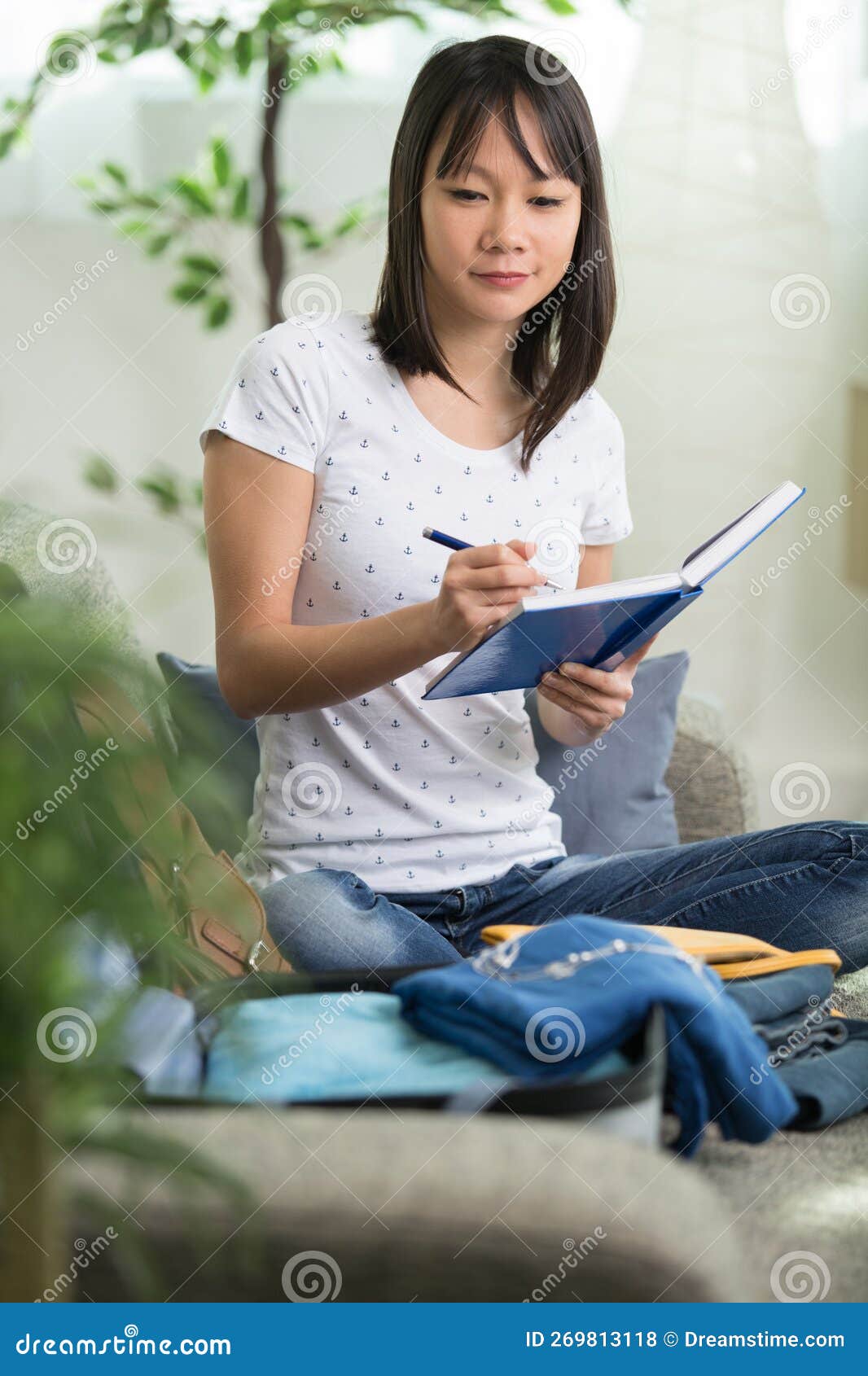 Woman checking list stock photo. Image of clothes, woman - 269813118
