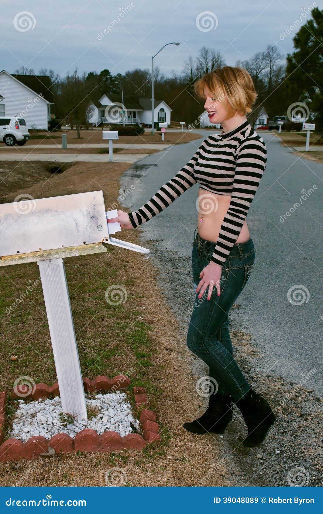 Woman checking the mail stock image. Image of postage - 39048089