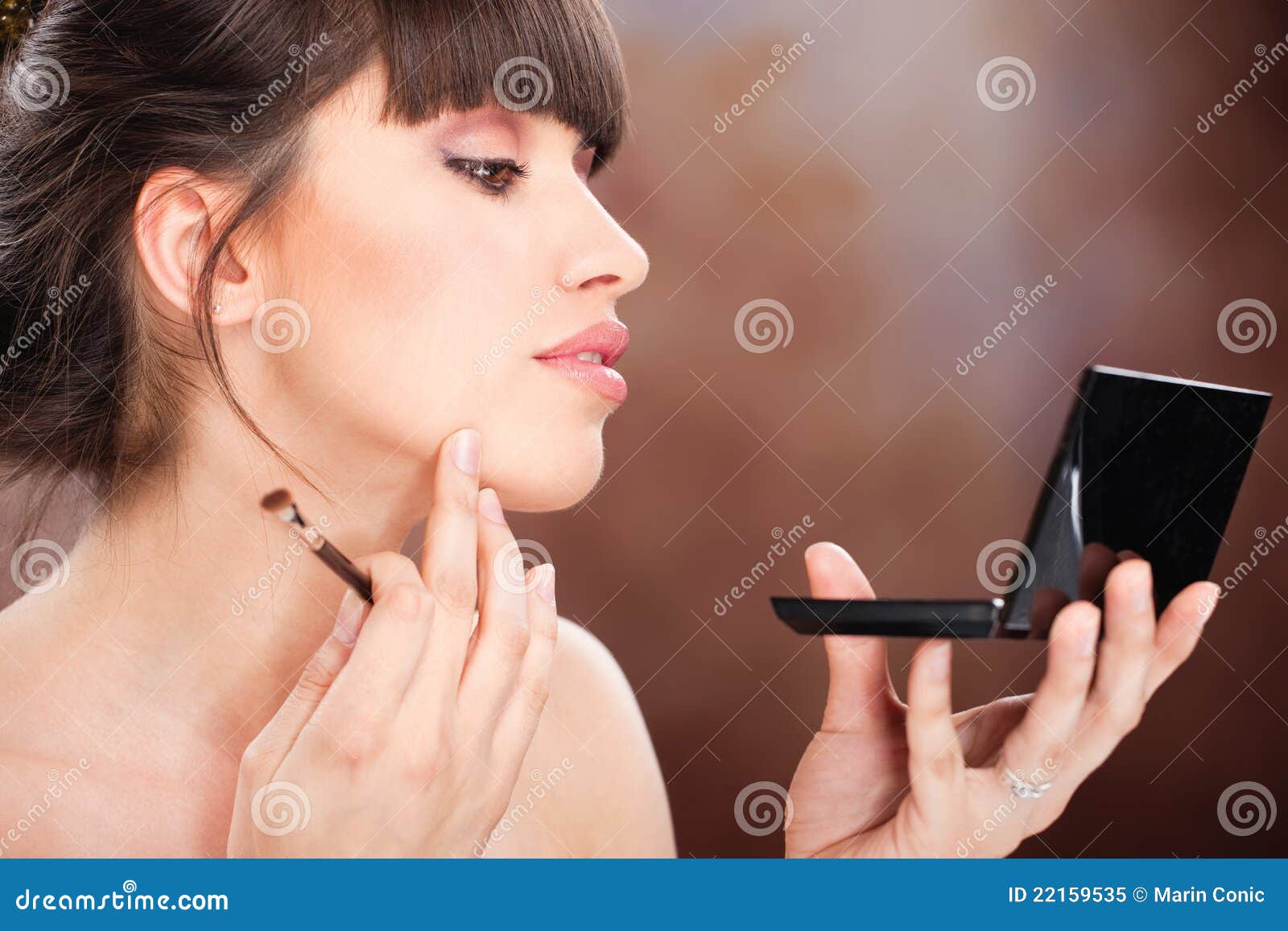 Woman checking makeup stock image. Image of brush, woman - 22159535