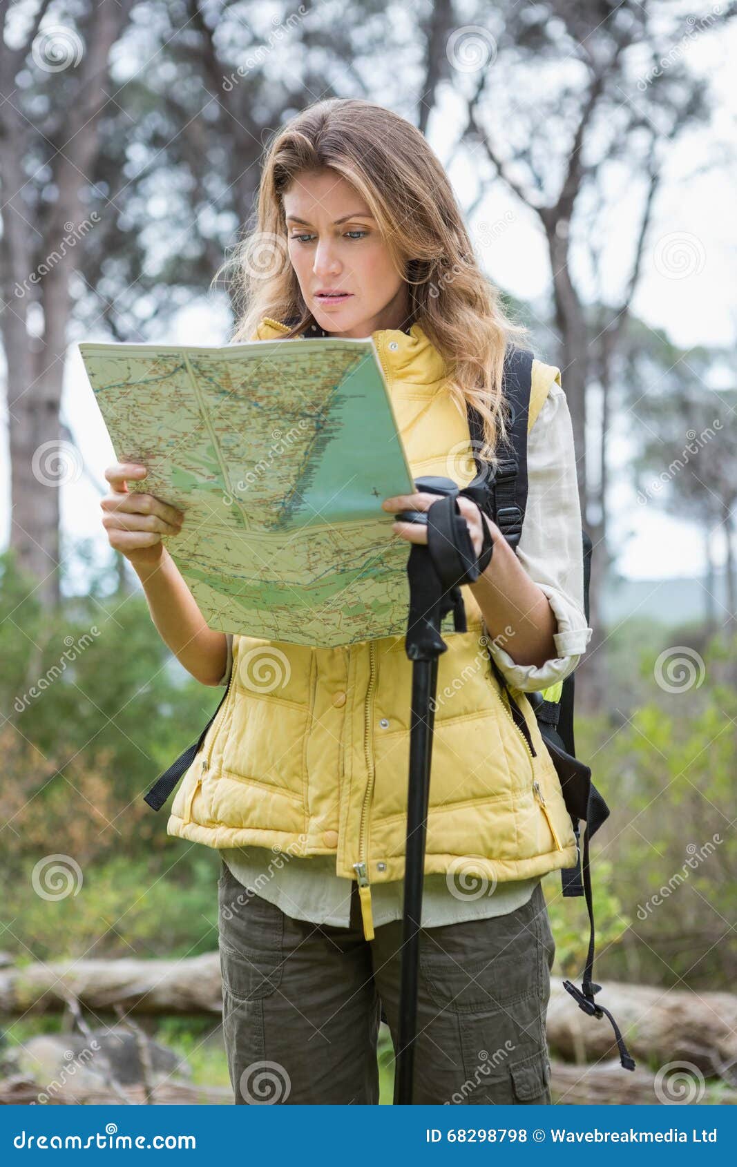 Woman checking the map stock photo. Image of lifestyle - 68298798