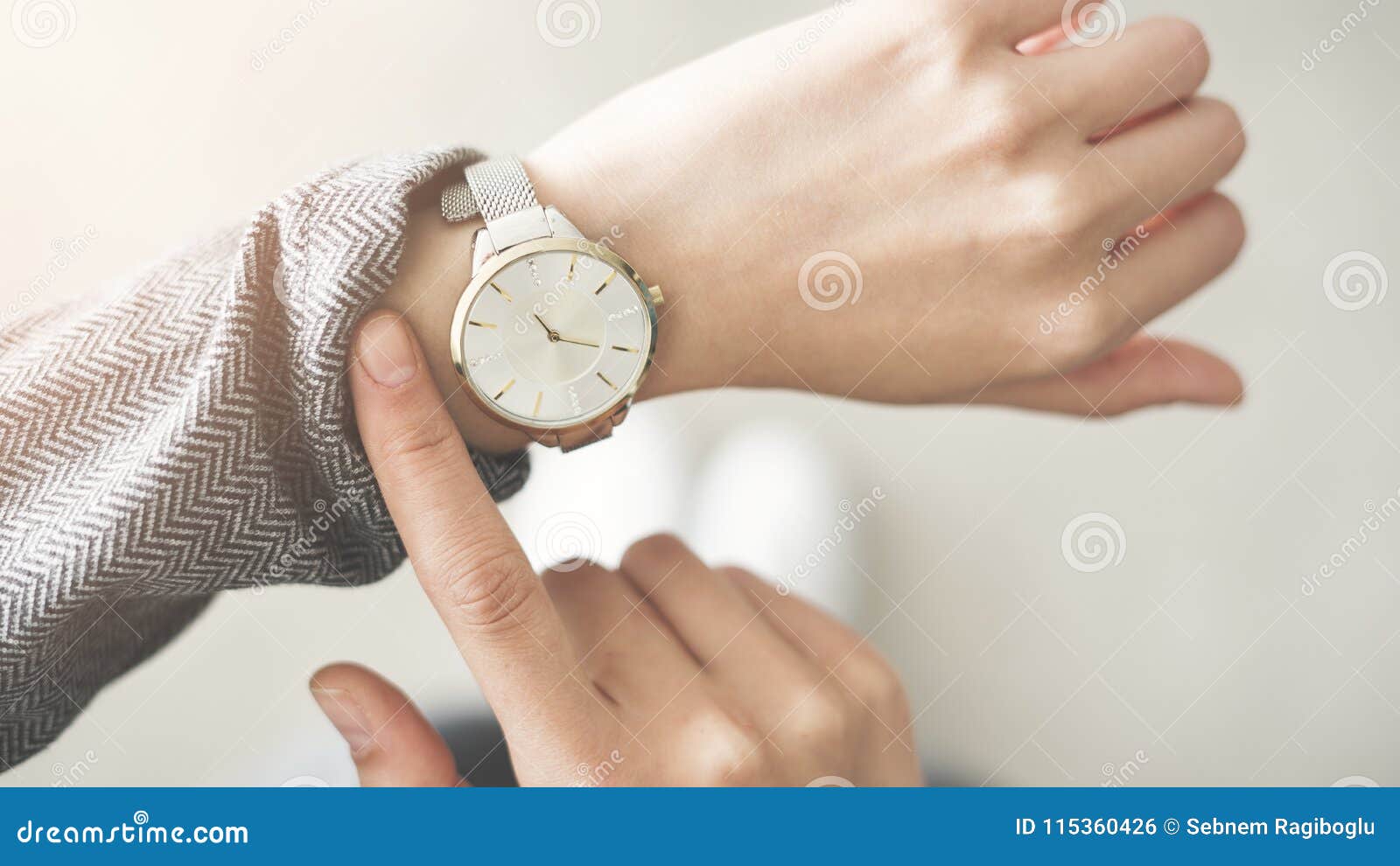 Woman Checking Time Her Watch Stock Photo - Image of check, hand: 115360426
