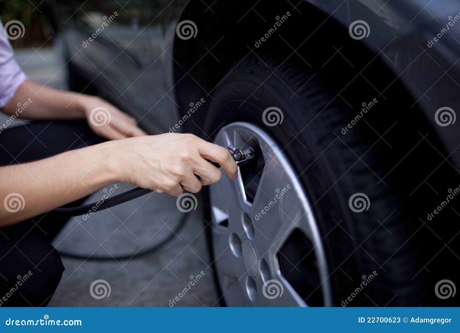 Woman Checking Tire Pressure Stock Image - Image of latin, industry ...
