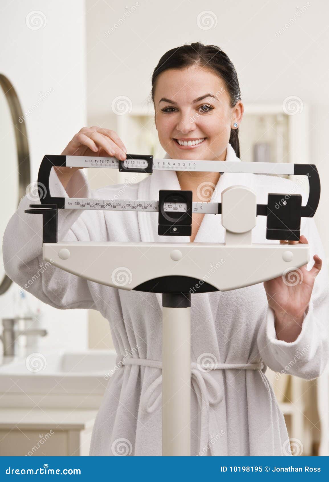 Woman Checking Weight stock image. Image of caucasian - 10198195