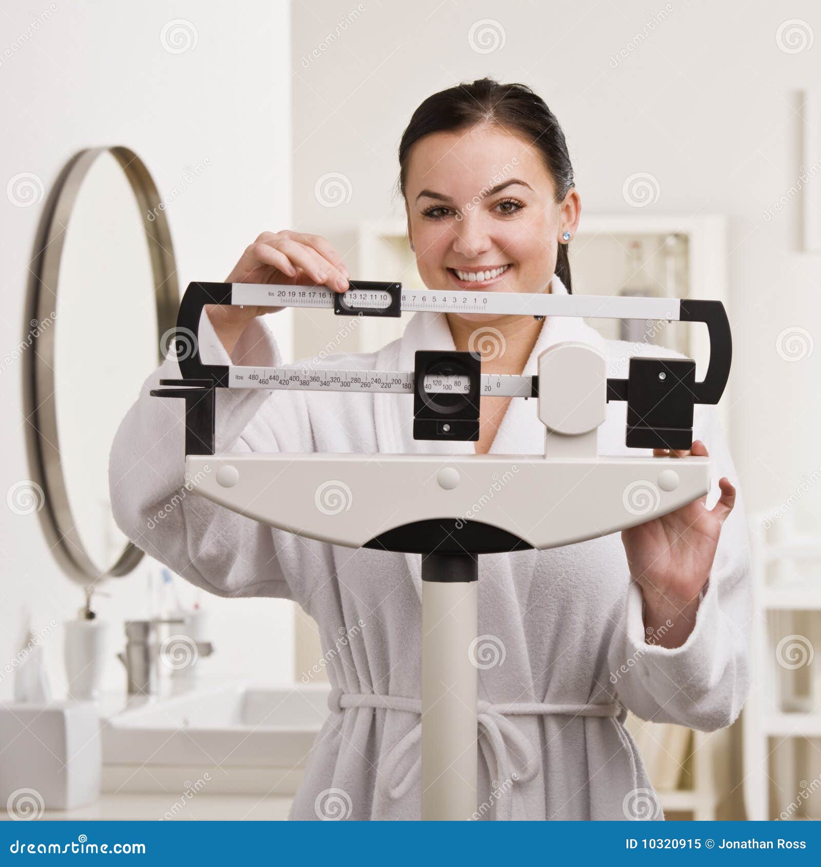 Woman Checking Weight stock image. Image of twenties - 10320915