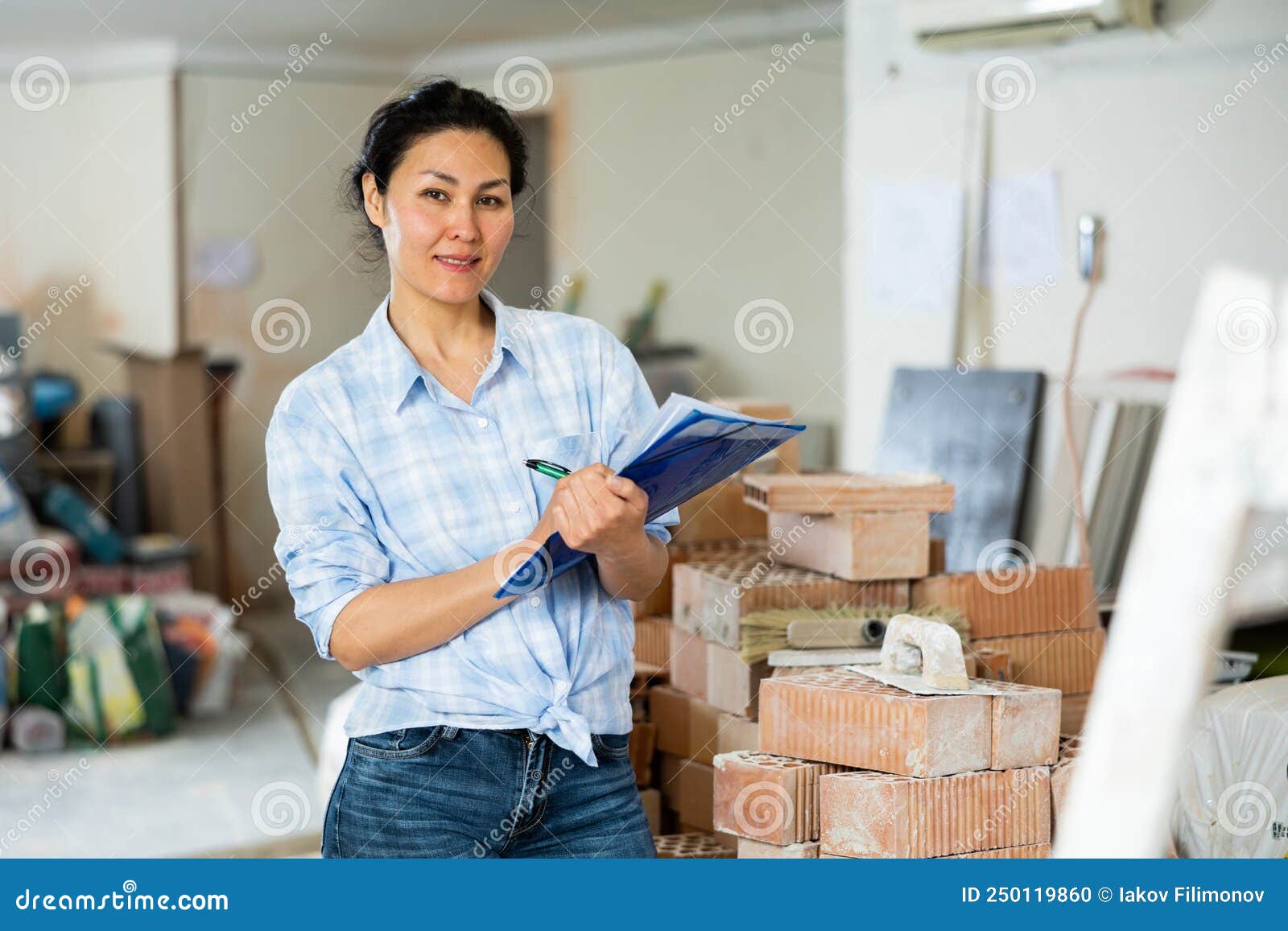 Woman Checks the Completed Construction Work on Drawing Stock Photo ...