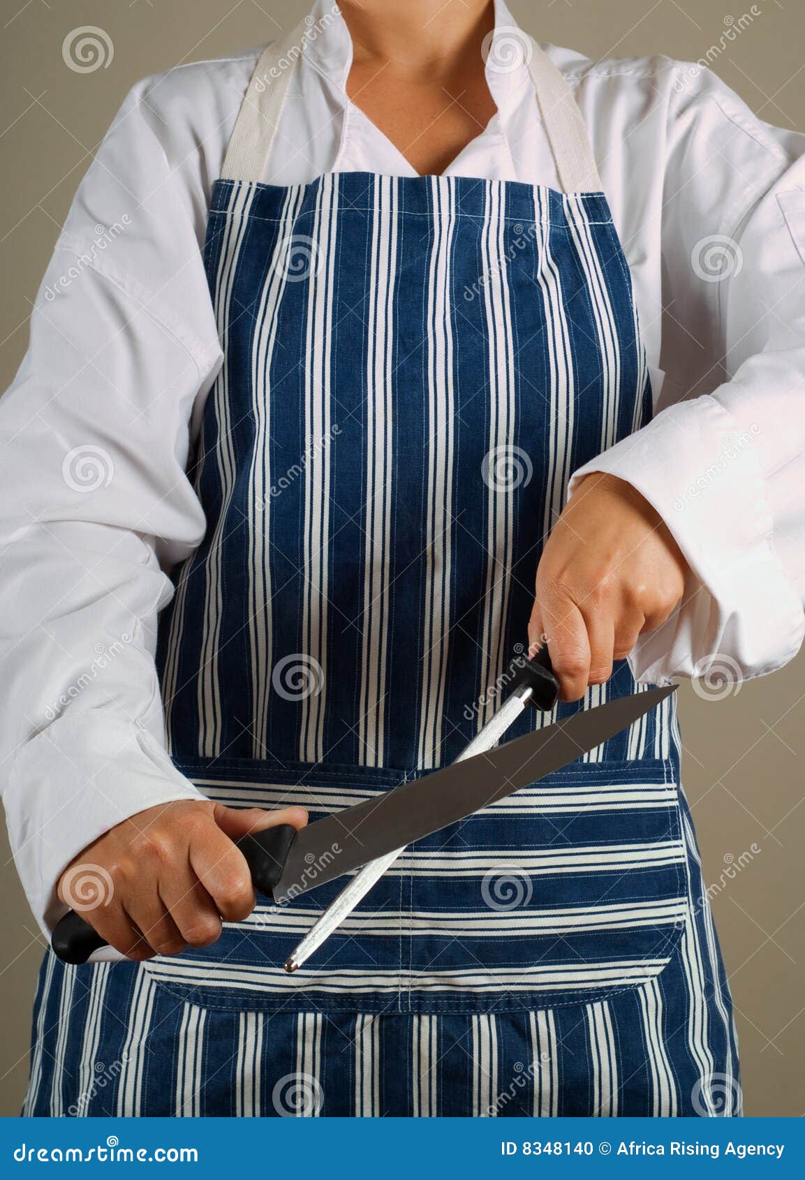 Woman Chef Sharpening Knife Stock Photo - Image of chef, kitchen: 8348140