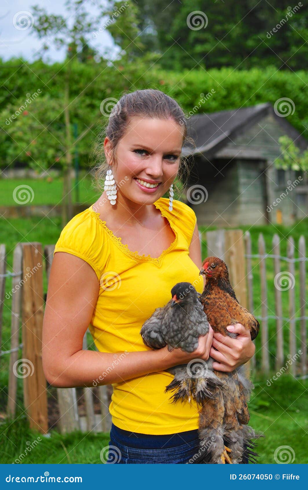 Woman with chickens stock photo. Image of care, hold - 26074050