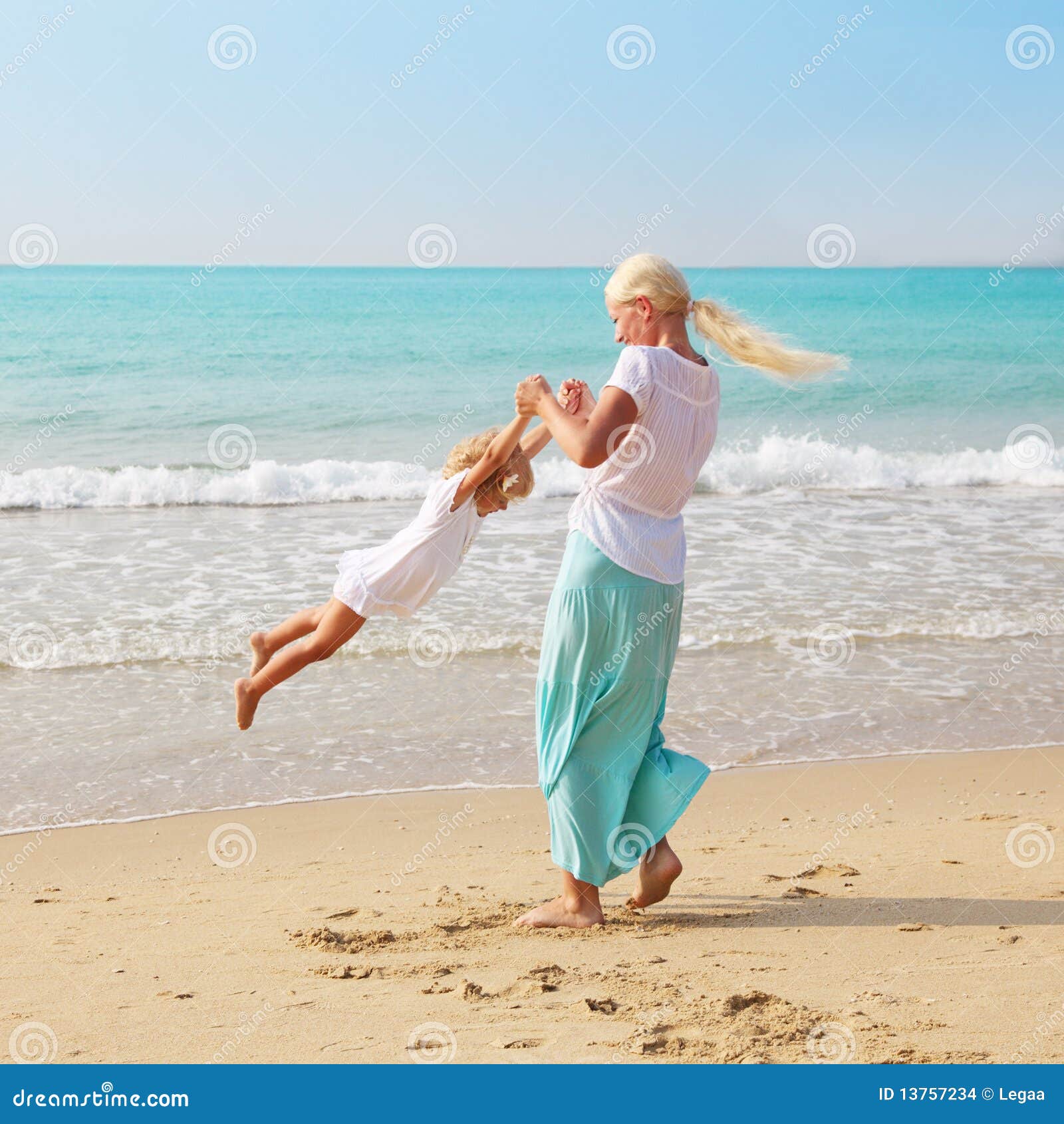 Woman and Child on the Beach Stock Photo - Image of child, beauty: 13757234