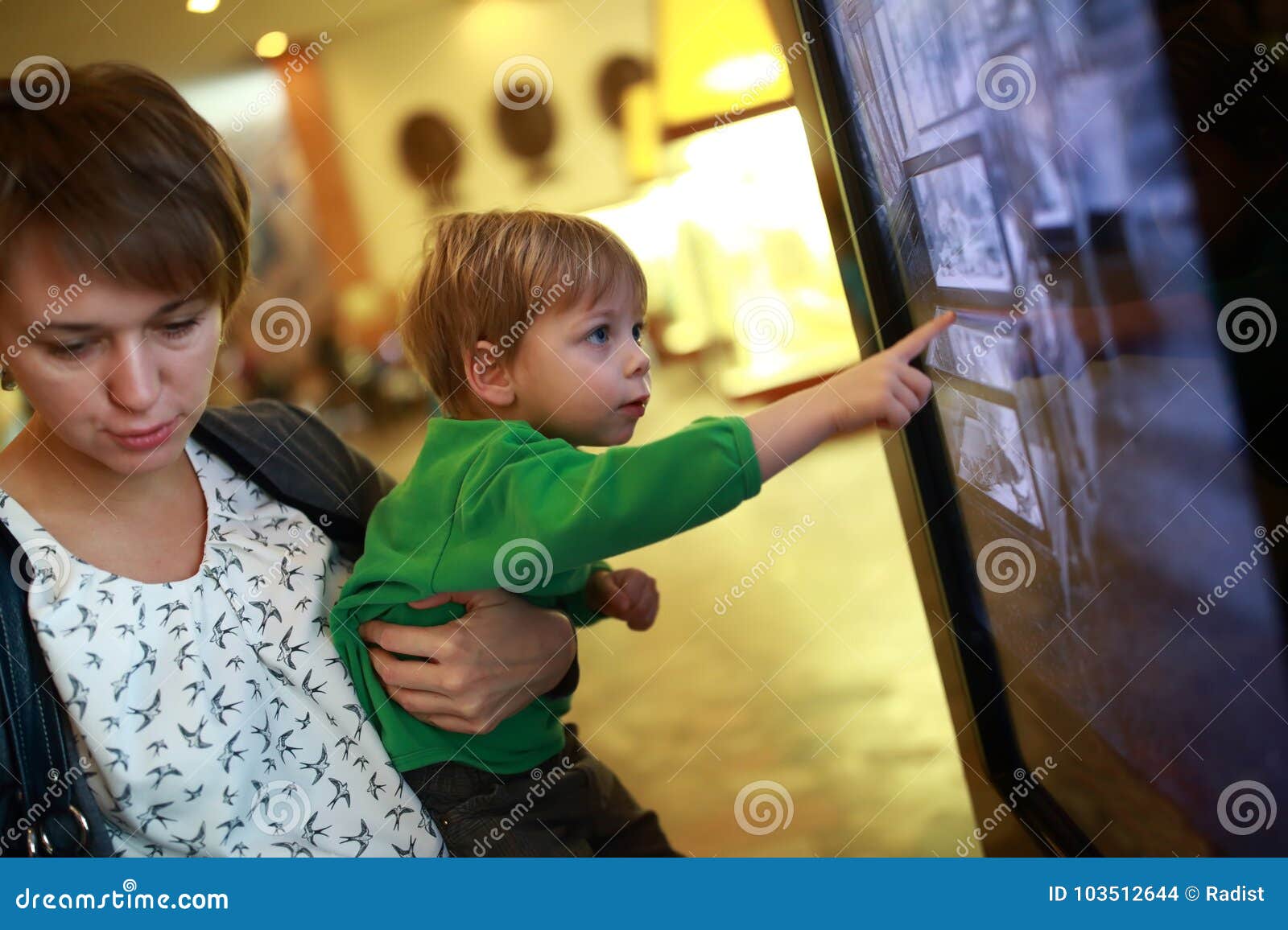 Woman with Child Using Touch Screen Stock Photo - Image of monitor ...