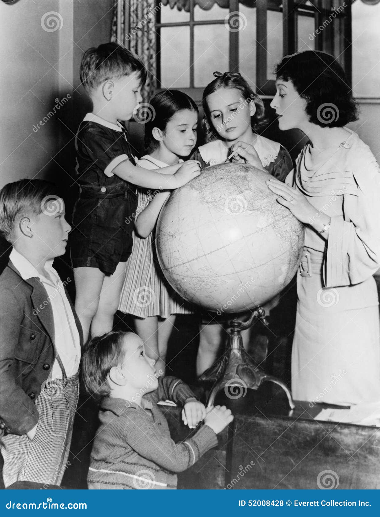 Children With A Globe Are Learning Geography Stock Photography ...