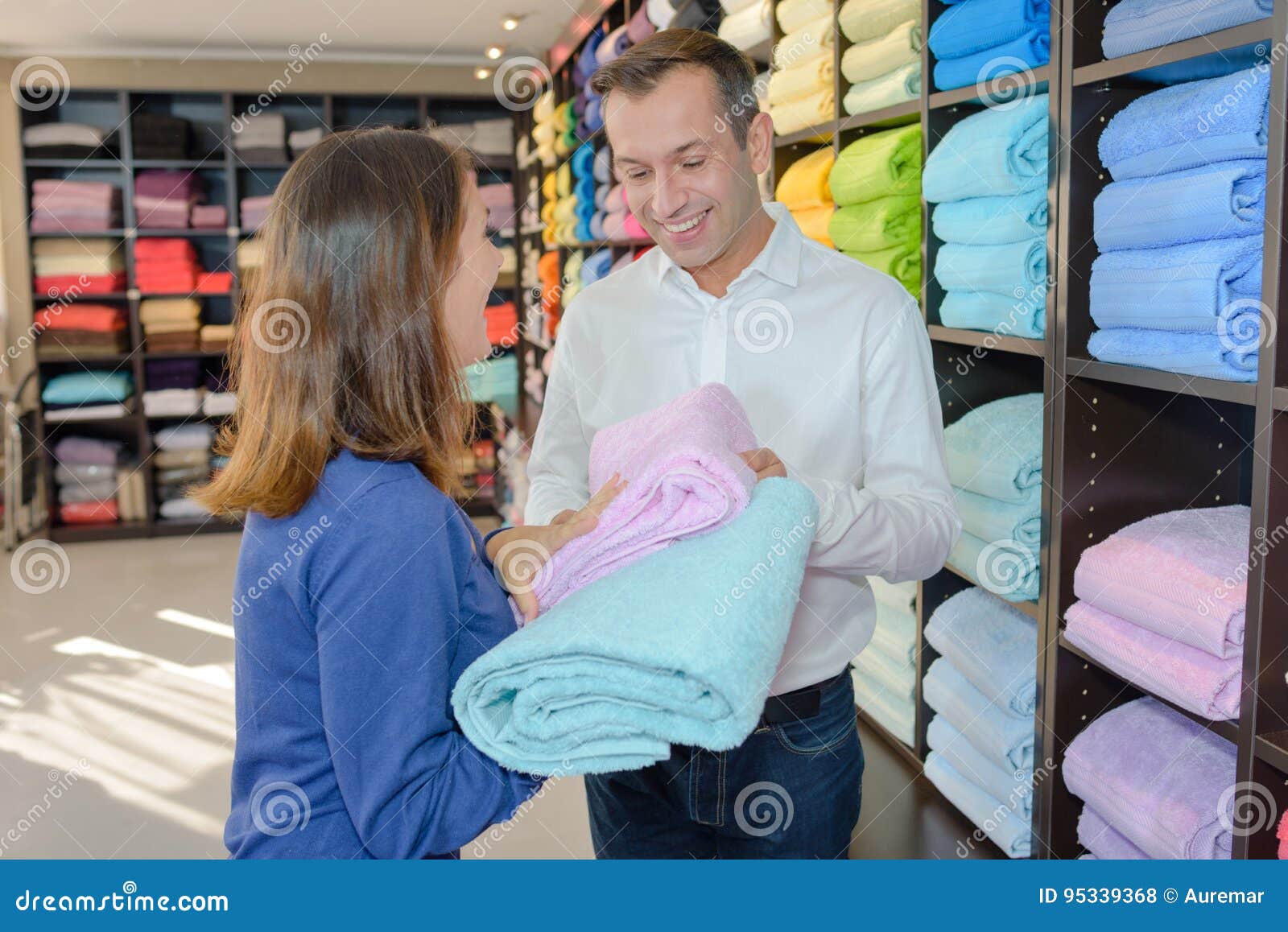 Woman Chooses Towels with Husband Stock Photo - Image of mall ...