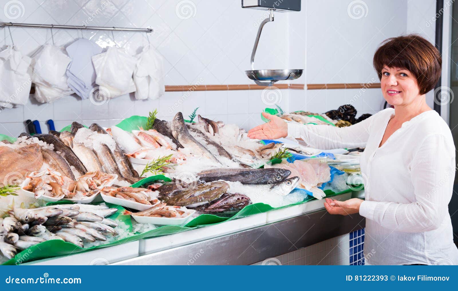 Woman Choosing Fish in Store Stock Image - Image of pensioners ...