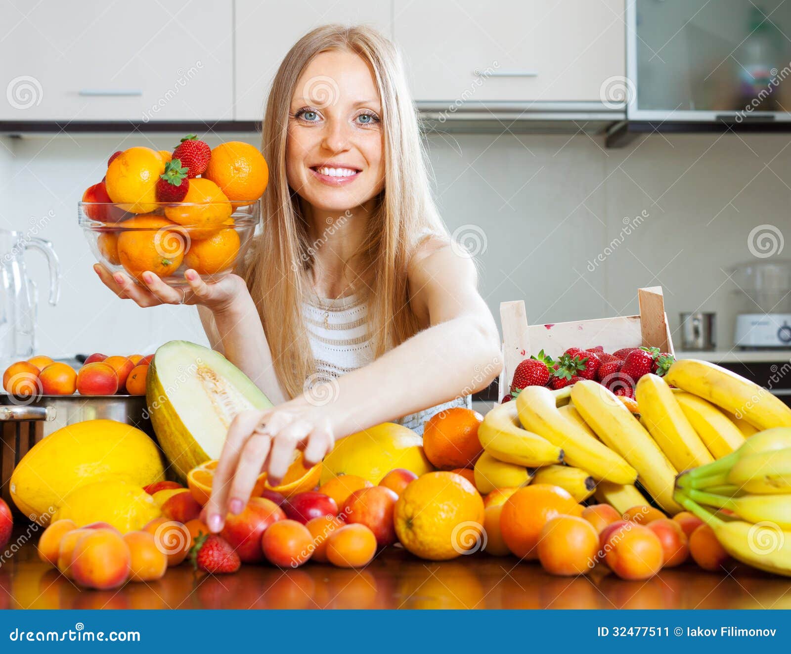 Woman choosing fruits stock image. Image of melon, pile - 32477511