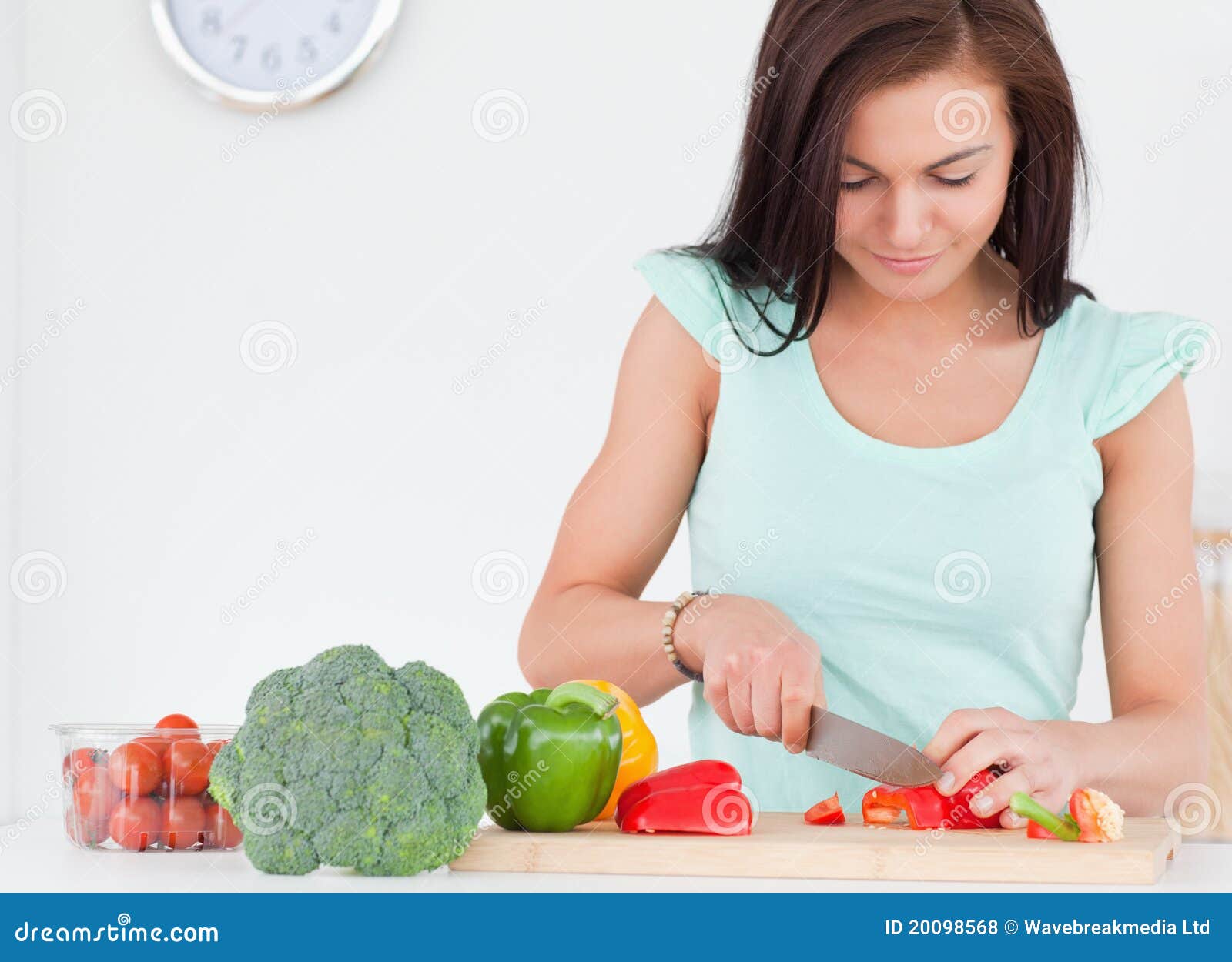 Woman chopping vegetables stock photo. Image of meal - 20098568