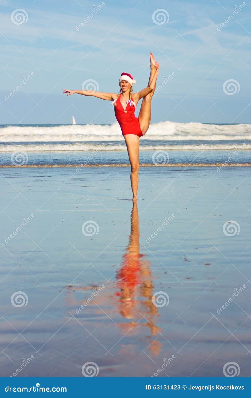 Woman Christmas Hat Doing Standing Splits Photos - Free & Royalty-Free ...