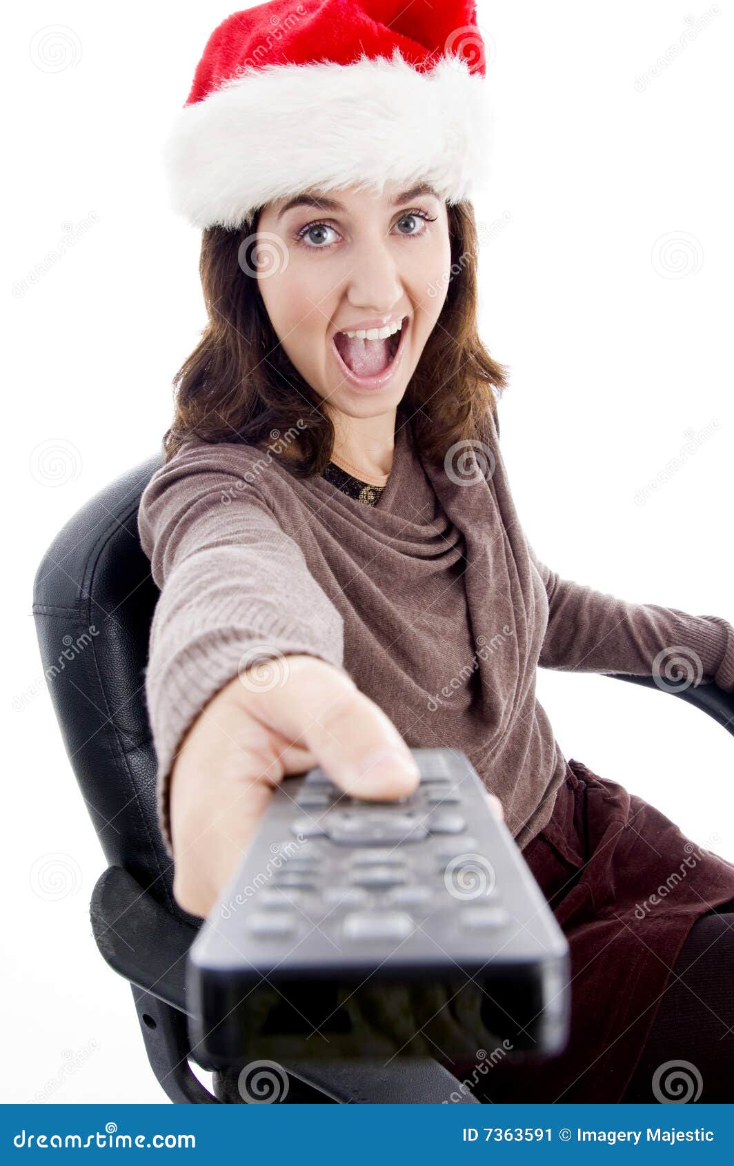 Woman in Christmas Hat Holding Remote Control Stock Image - Image of ...