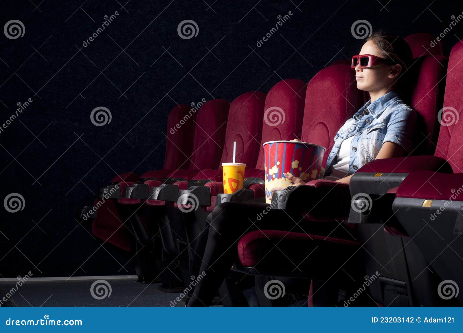 Woman at the cinema stock photo. Image of looking, glasses - 23203142