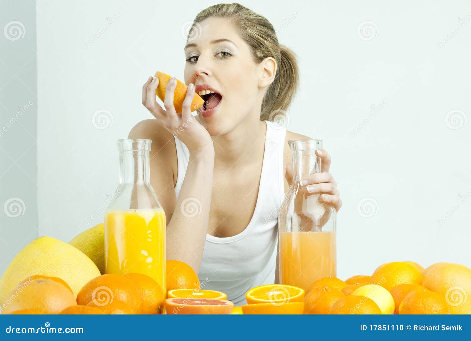 Woman with citrus fruit stock photo. Image of nutrition - 17851110