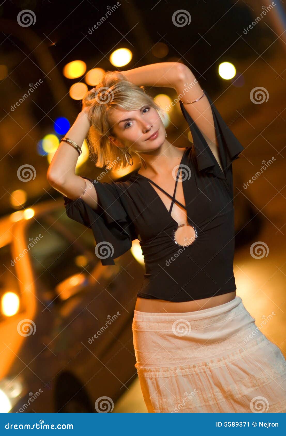 Woman in a city at night stock image. Image of abstract - 5589371