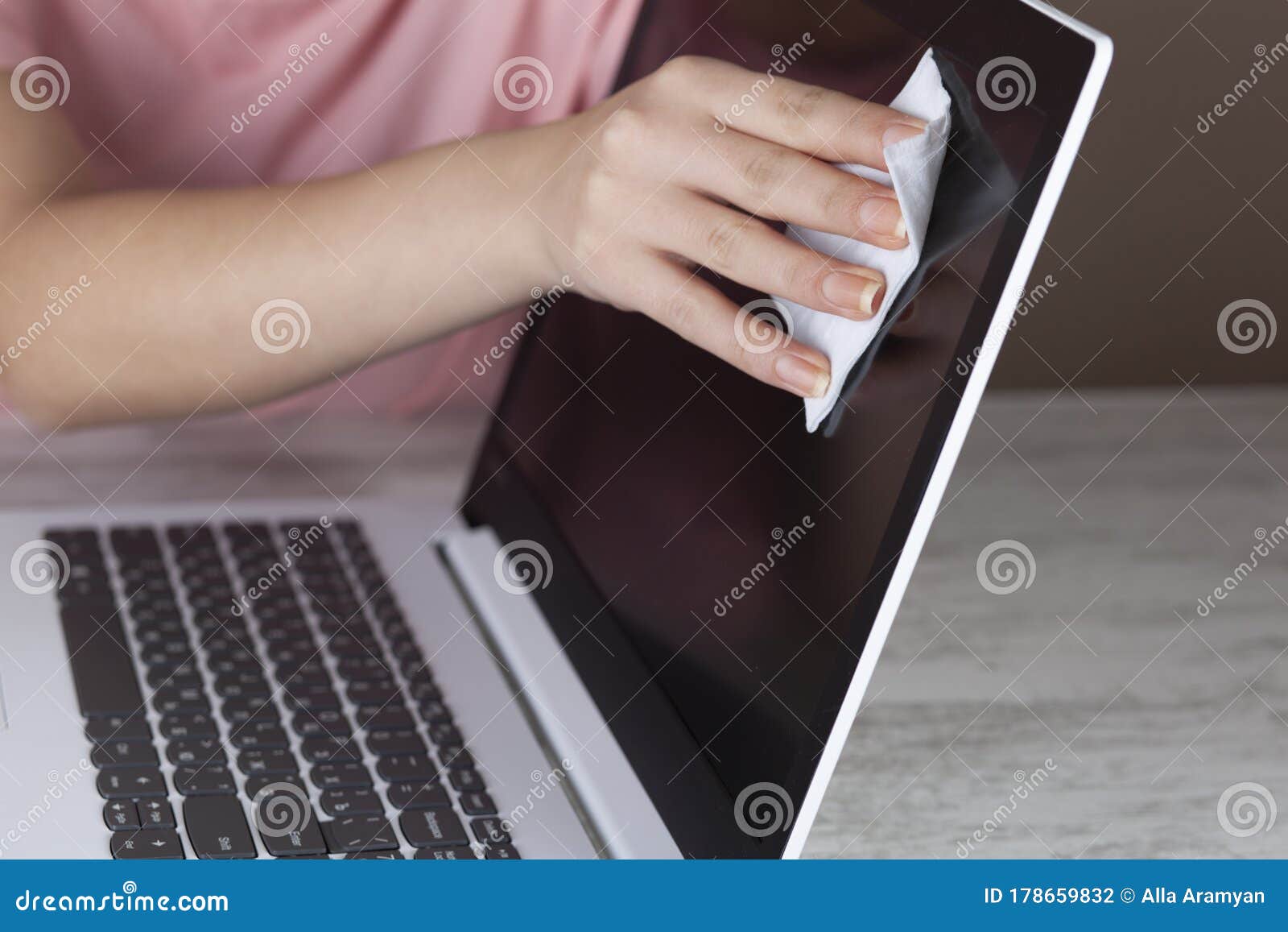 Woman cleaning computer stock photo. Image of covid19 - 178659832