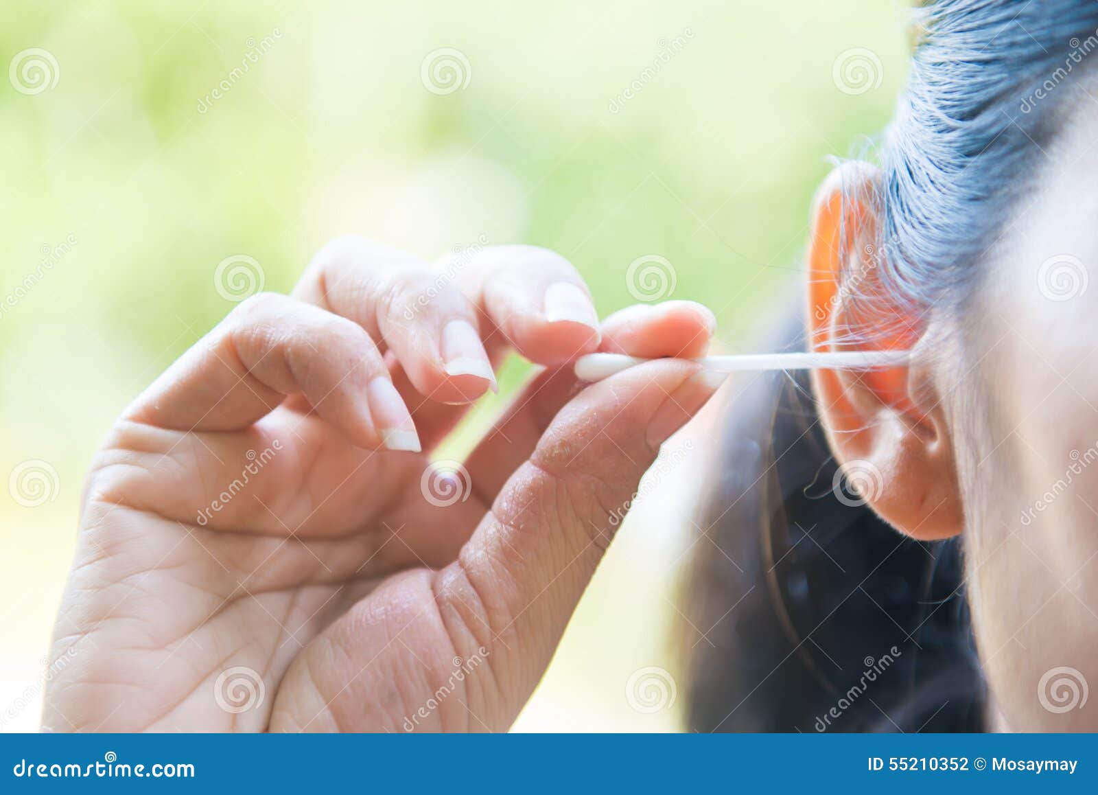 A Woman Cleaning Ear with Cotton Bud Stock Photo - Image of cotton ...