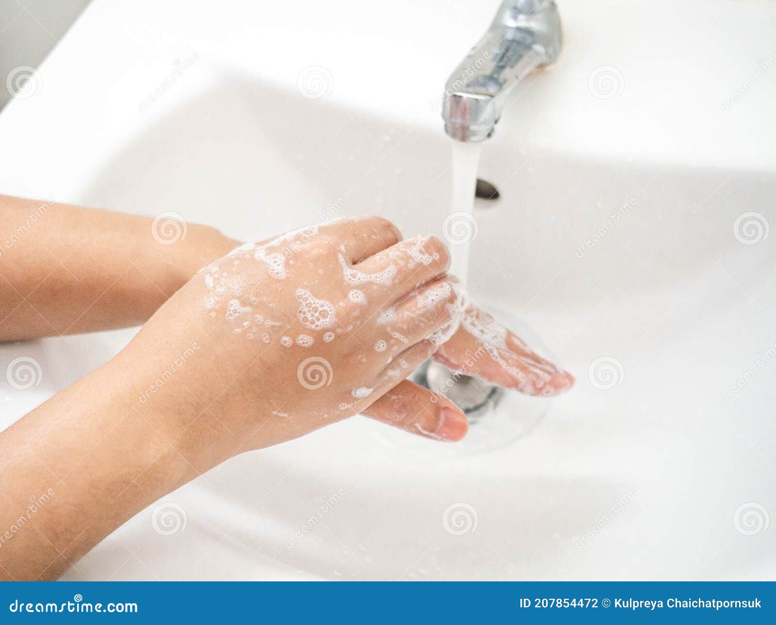 A Woman Cleaning Hands Use Hand Soap until White Bubbles Form in the ...