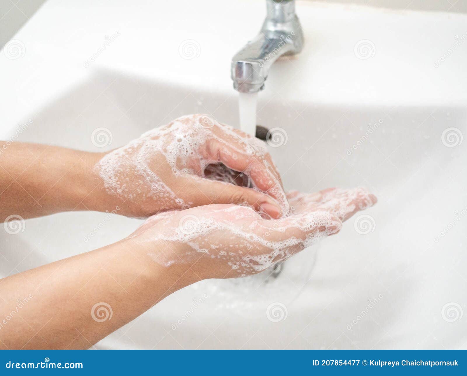 A Woman Cleaning Hands Use Hand Soap until White Bubbles Form in the ...