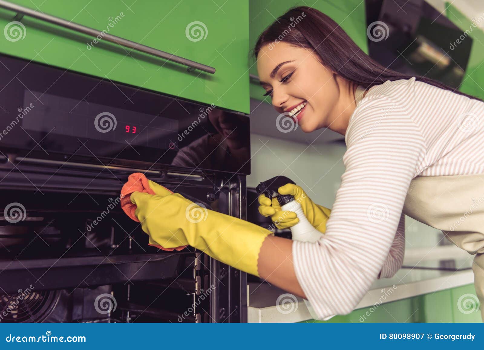Woman cleaning her kitchen stock image. Image of housework - 80098907