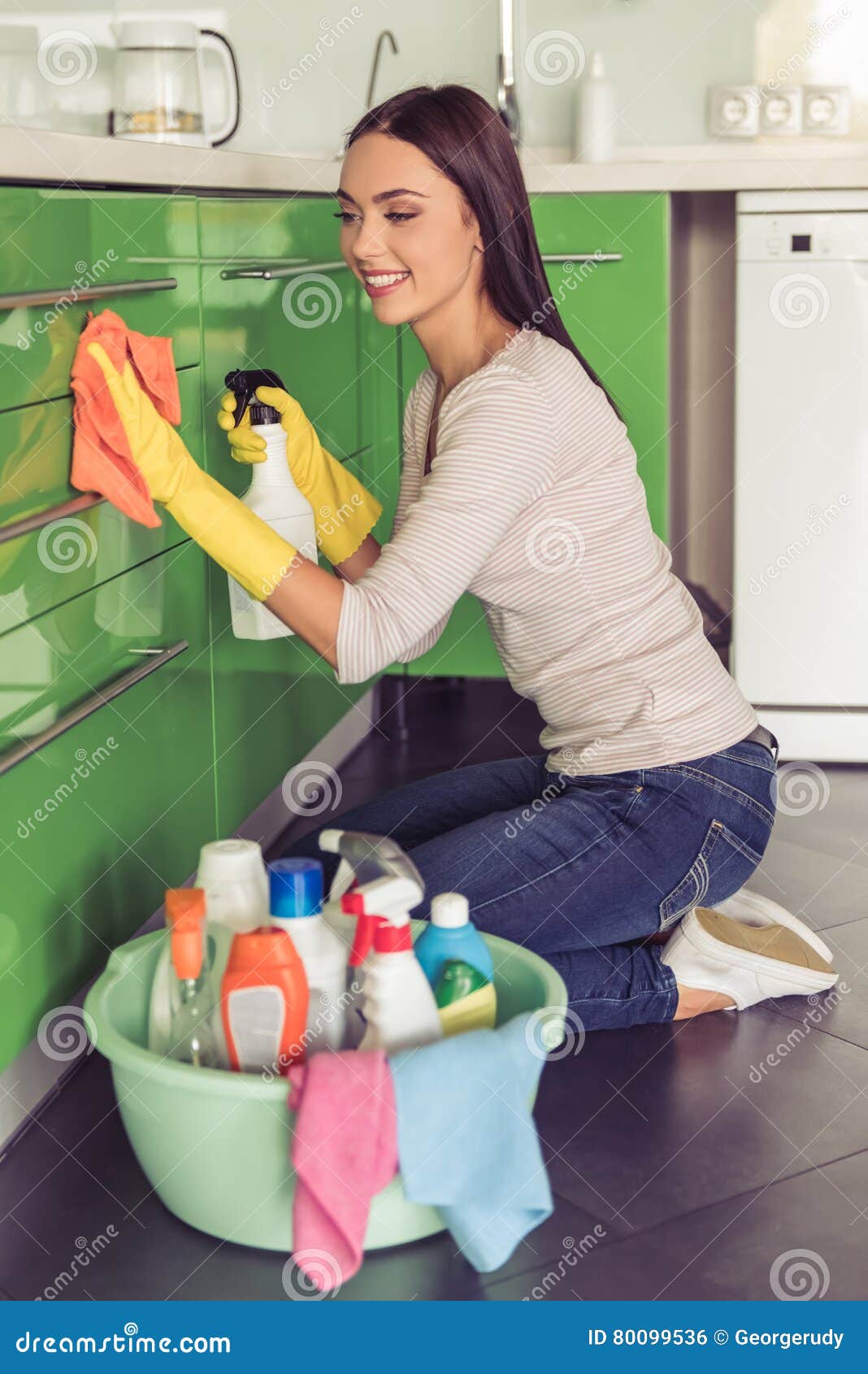 Woman cleaning her kitchen stock photo. Image of concept - 80099536