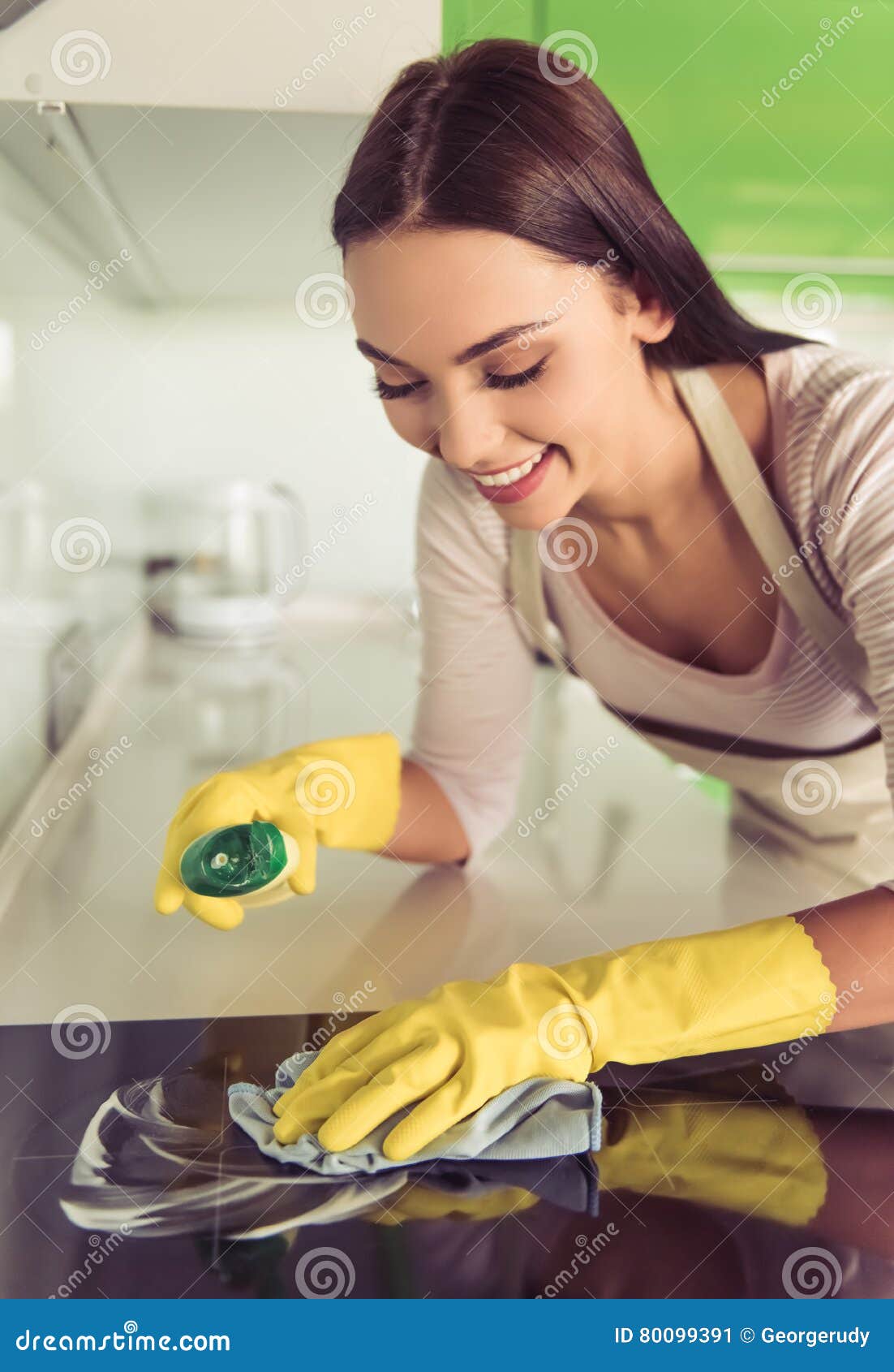 Woman cleaning her kitchen stock image. Image of chores - 80099391