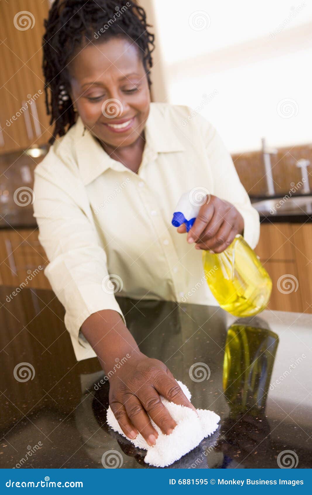 Woman Cleaning Kitchen Counter Stock Image - Image of spraying ...