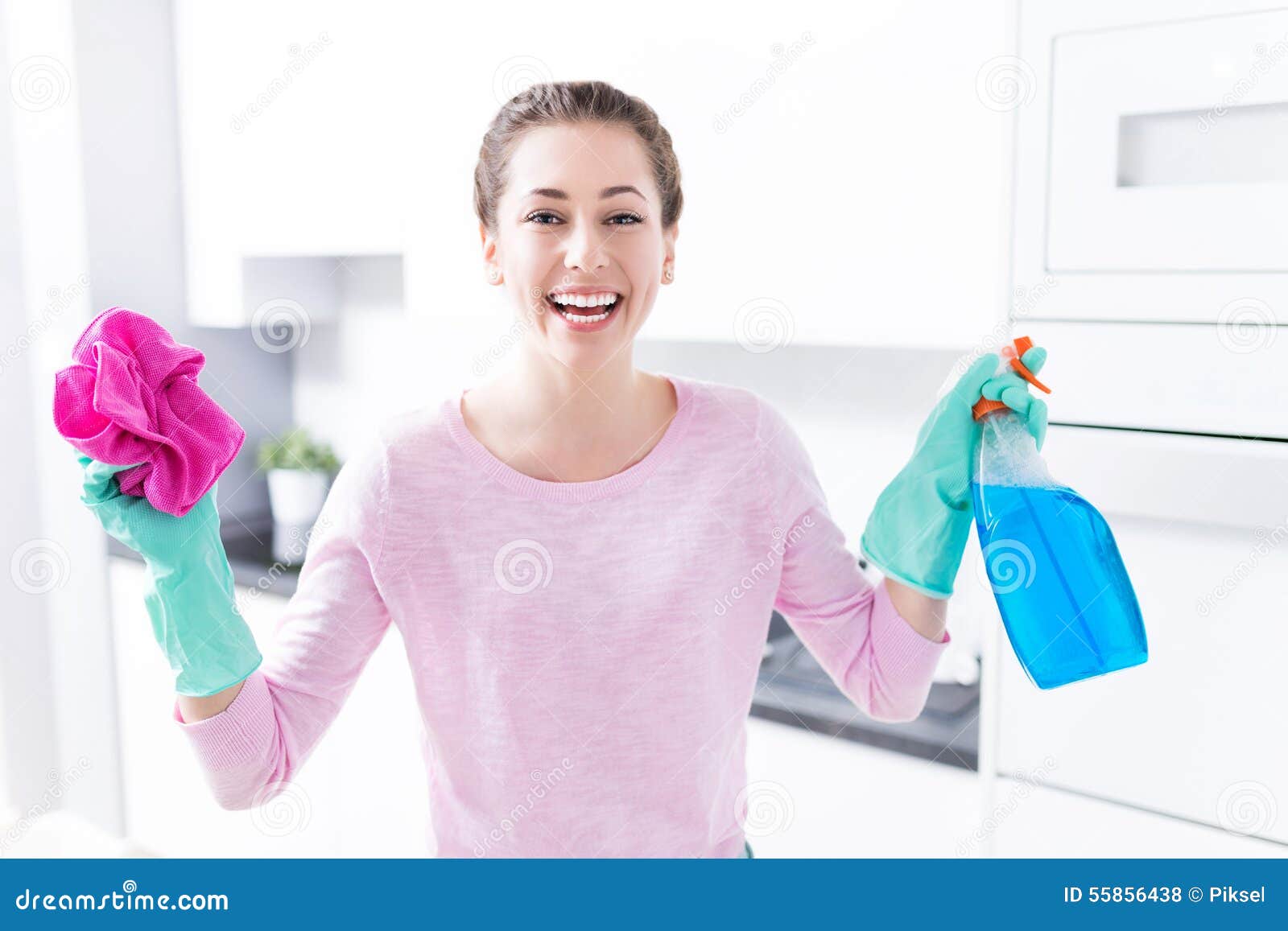 Woman cleaning kitchen stock photo. Image of cleanser - 55856438