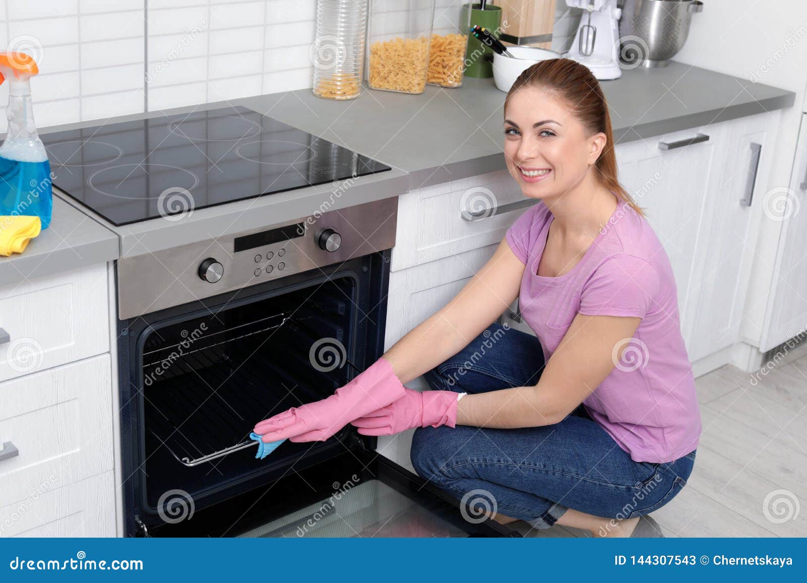 Woman Cleaning Oven Rack with Rag Stock Image - Image of appliance ...