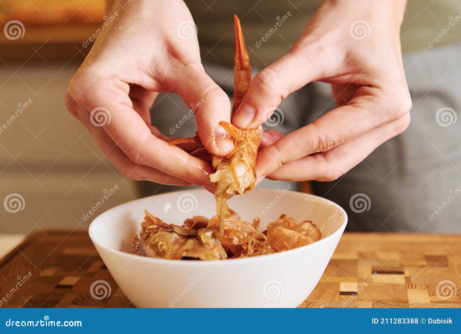 Woman Cleaning Shrimps for Cooking. Process of Hands Peel Shrimps Shell ...