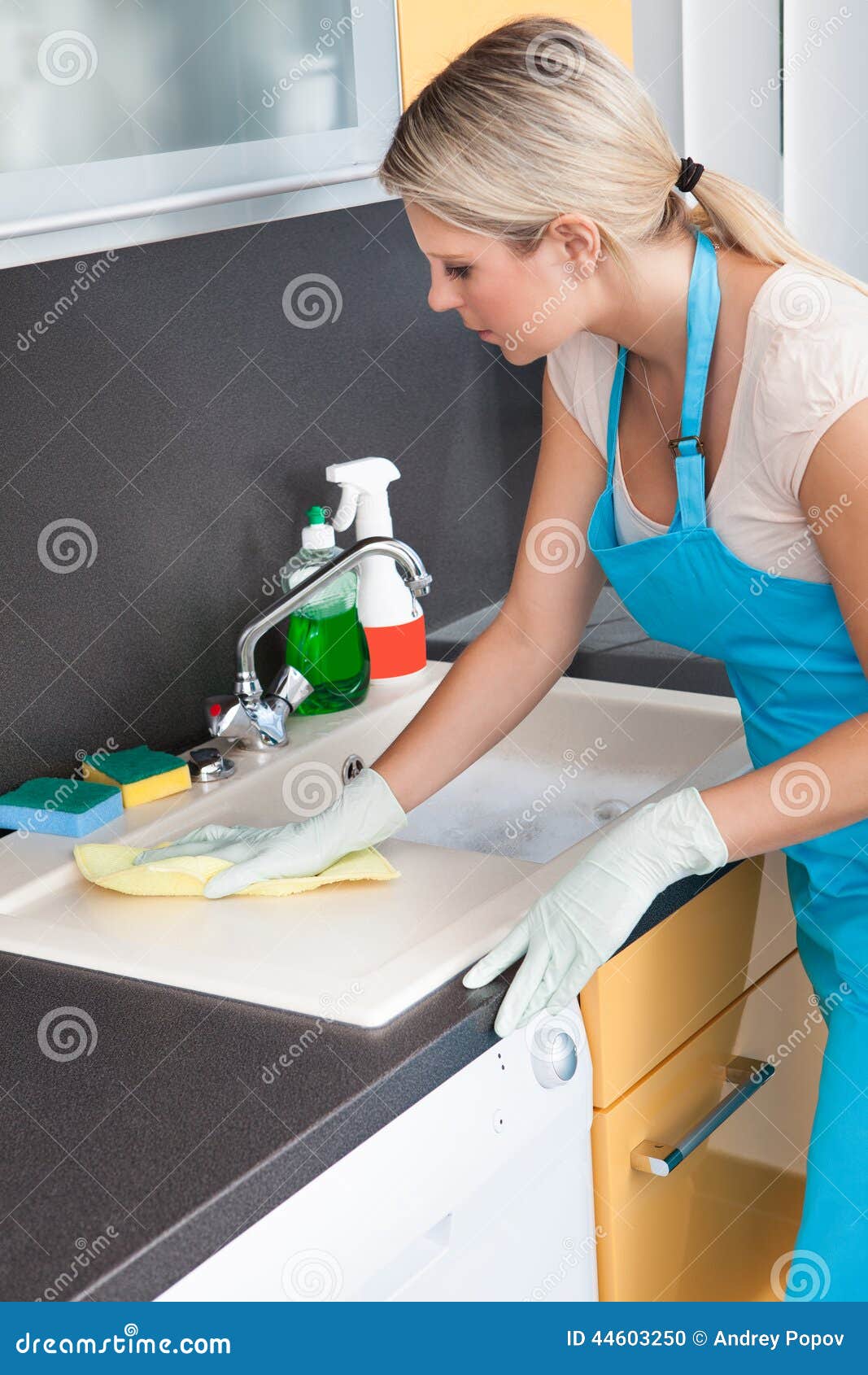 Woman cleaning worktop stock photo. Image of housekeeping - 44603250
