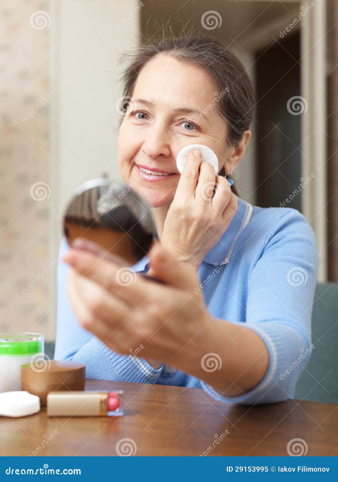 Woman cleans the make-up stock image. Image of making - 29153995