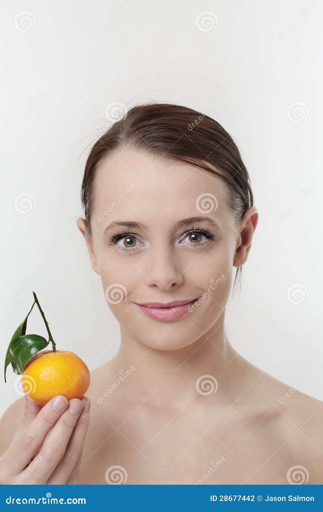 Woman with the Clementine stock photo. Image of adult - 28677442