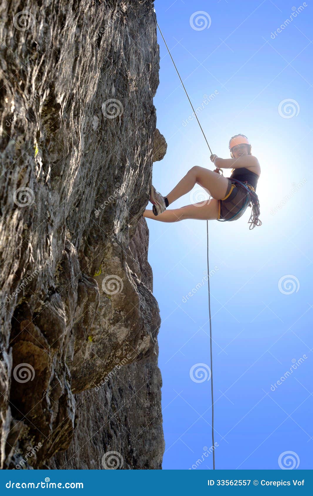 Woman Climbing Rock stock image. Image of angle, abseiling - 33562557