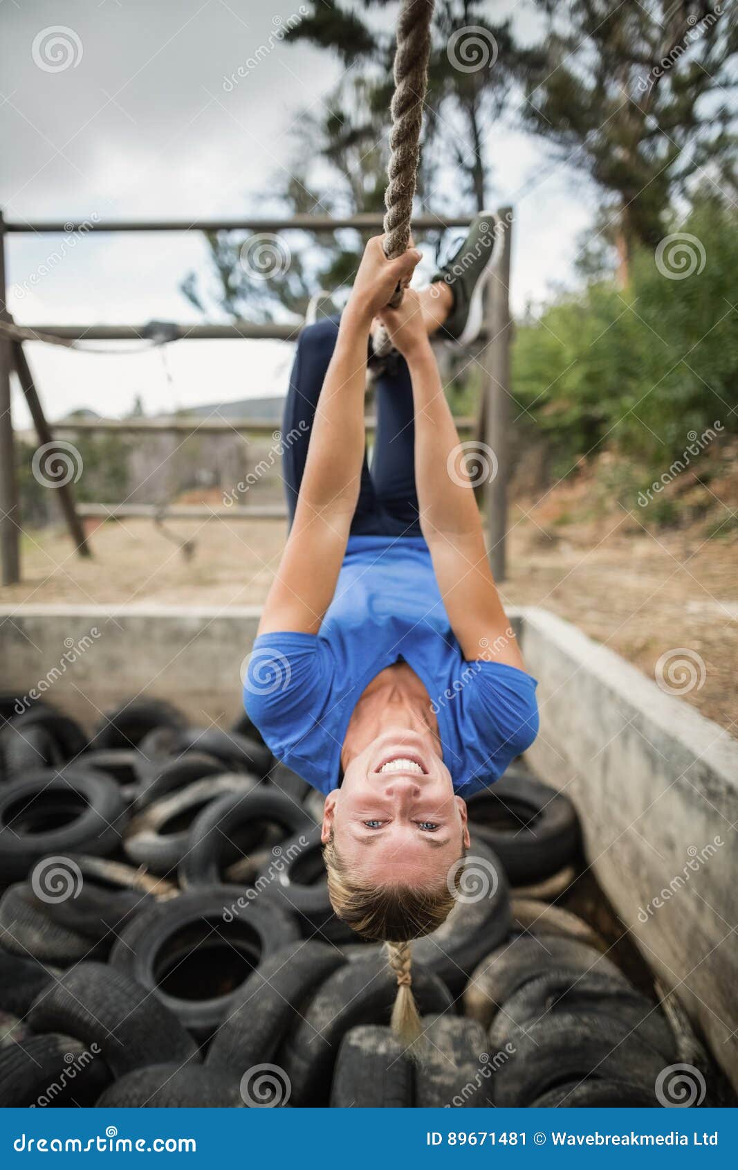 Woman Climbing Rope during Obstacle Course Training Stock Image - Image ...