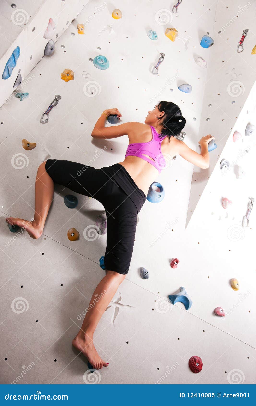 Woman at the climbing wall stock image. Image of training - 12410085
