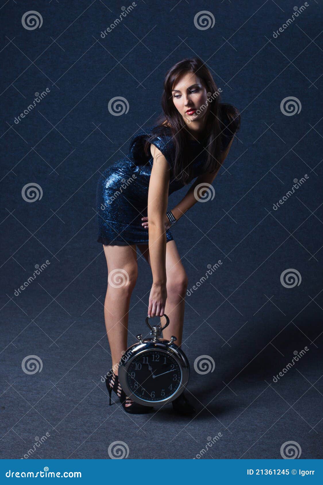Woman with clock stock image. Image of glamor, person - 21361245