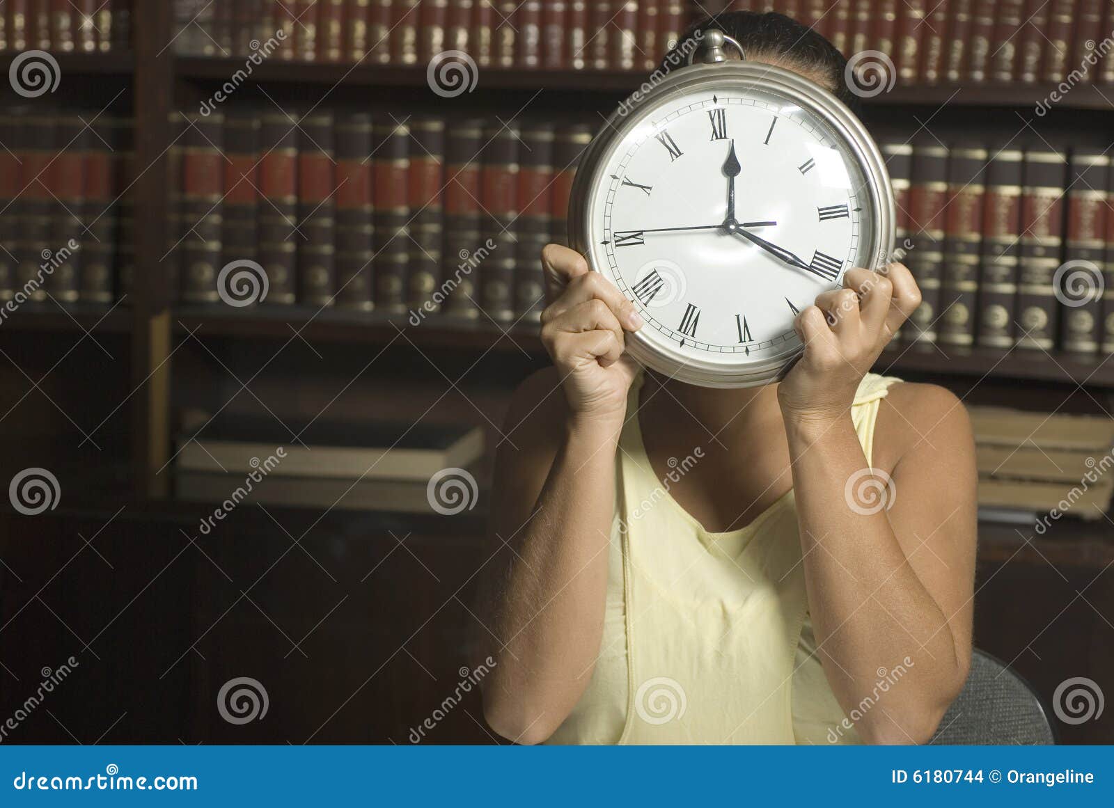 Woman with Clock - Horizontal Stock Photo - Image of sitting, female ...