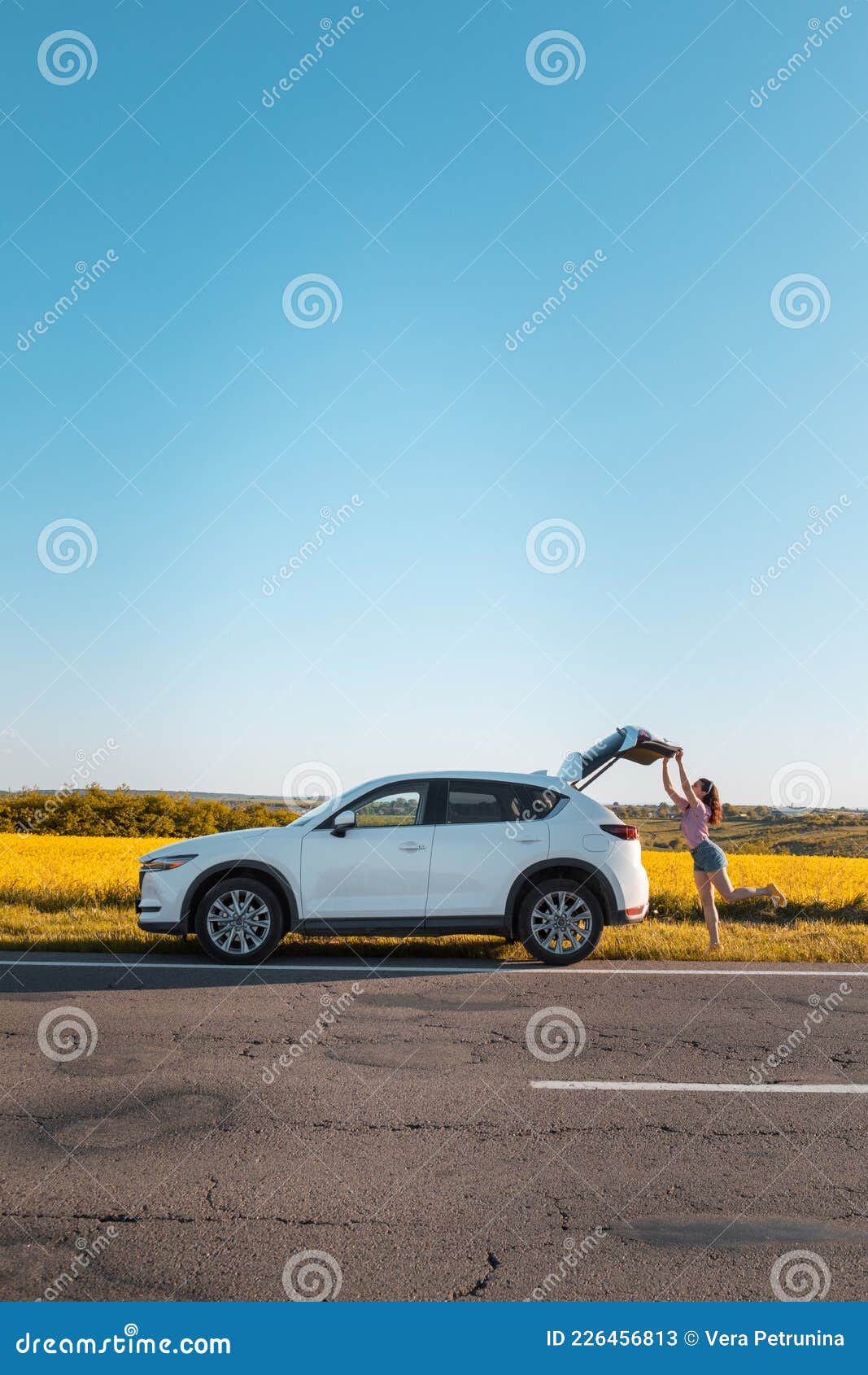 Woman Closing Car Trunk Parked at Roadside Stock Image - Image of ...