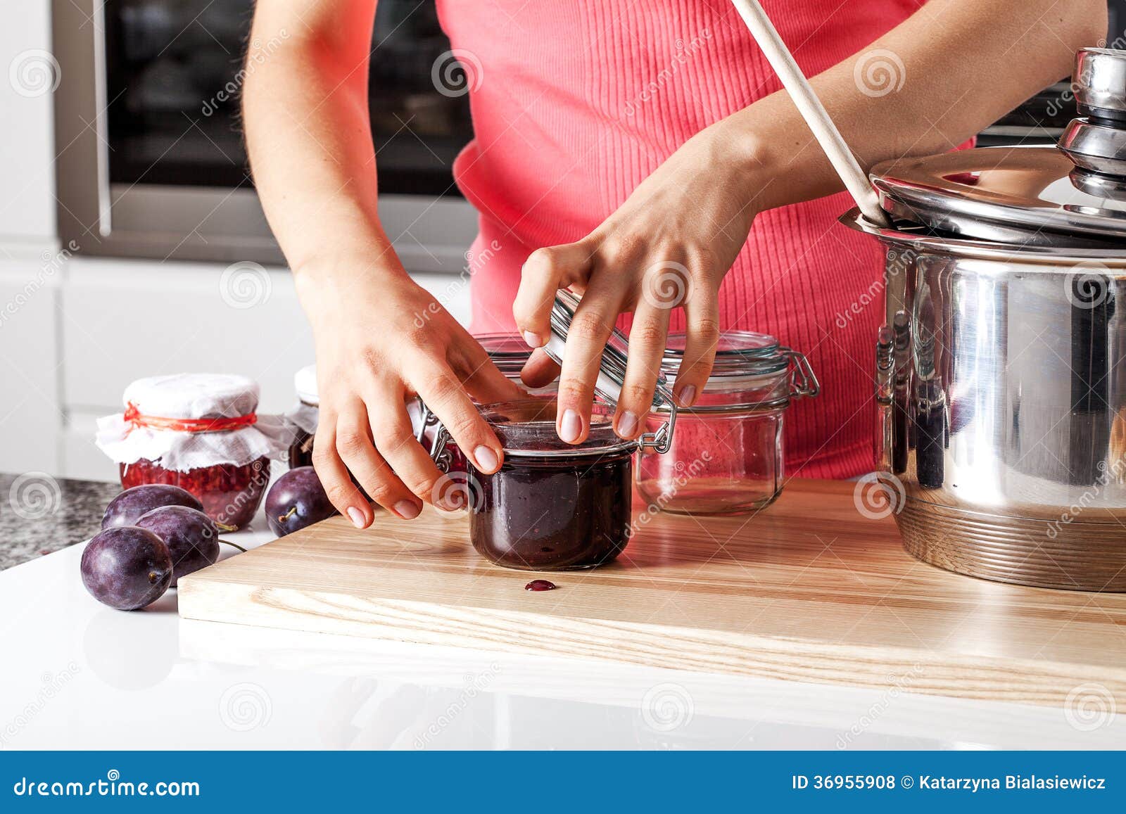 Woman closing the jars stock photo. Image of closing - 36955908