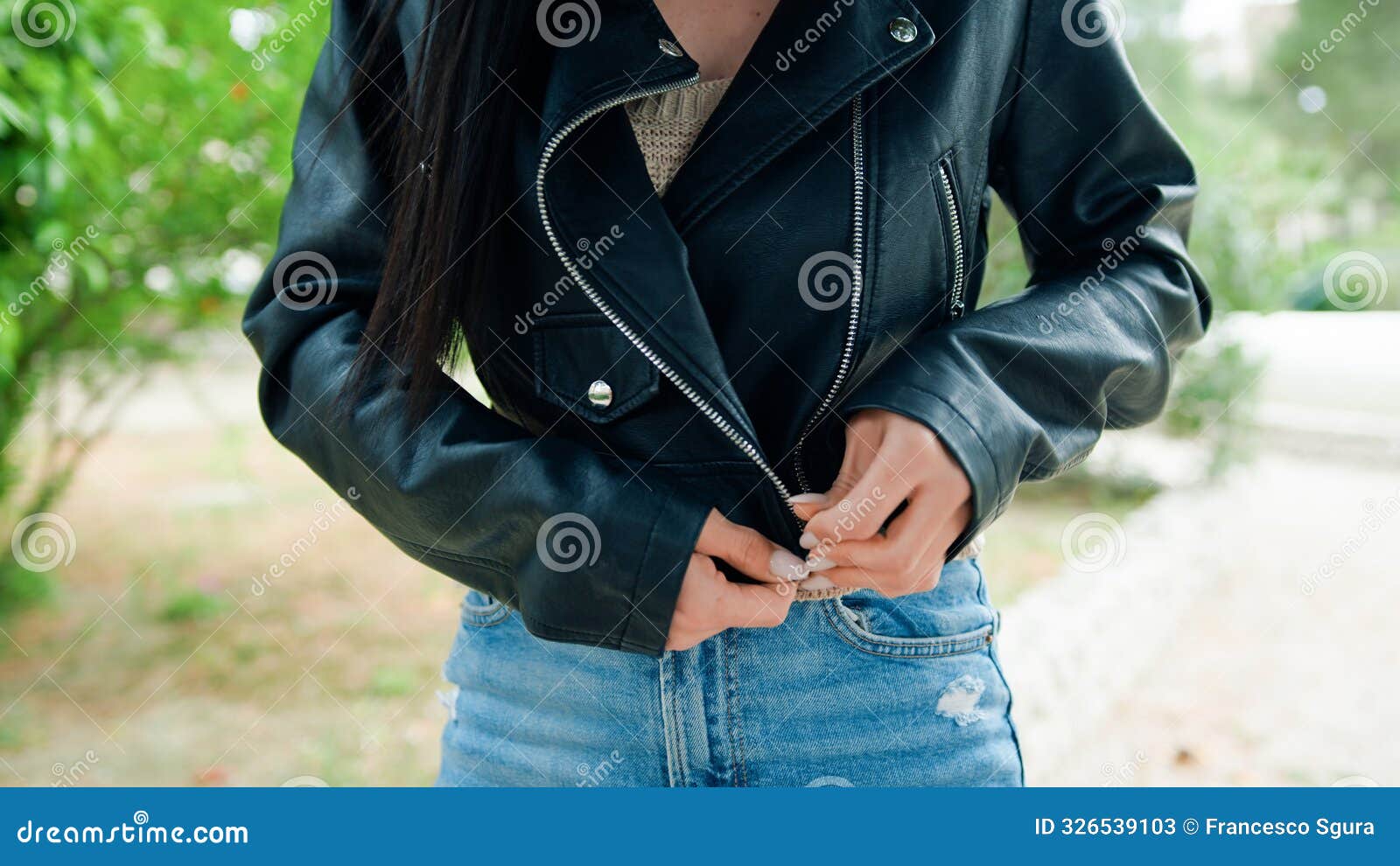 Woman Closing the Zip of Her Leather Jacket Stock Image - Image of ...