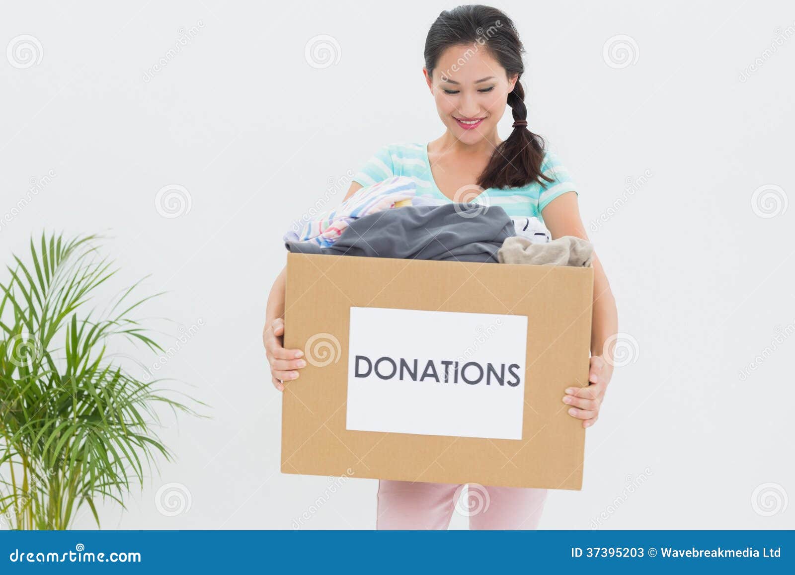 Woman with Clothes Donation Stock Image - Image of community, social ...