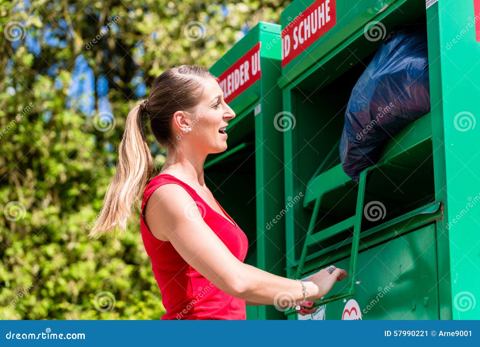Woman at Clothes Recycling Skip Stock Image - Image of carrying, skip ...
