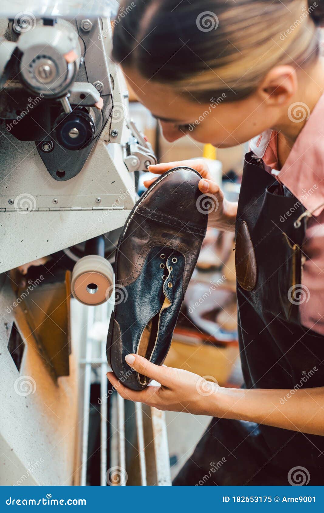 Woman Cobbler Working on Machine in Her Shoemaker Workshop Stock Image ...