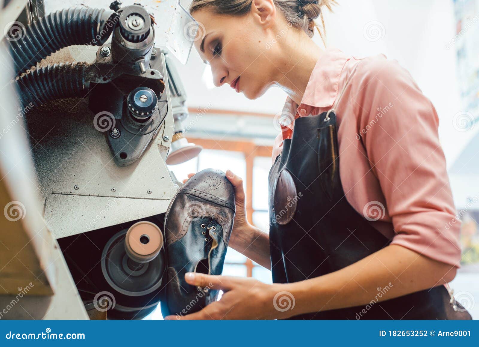 Woman Cobbler Working on Machine in Her Shoemaker Workshop Stock Photo ...